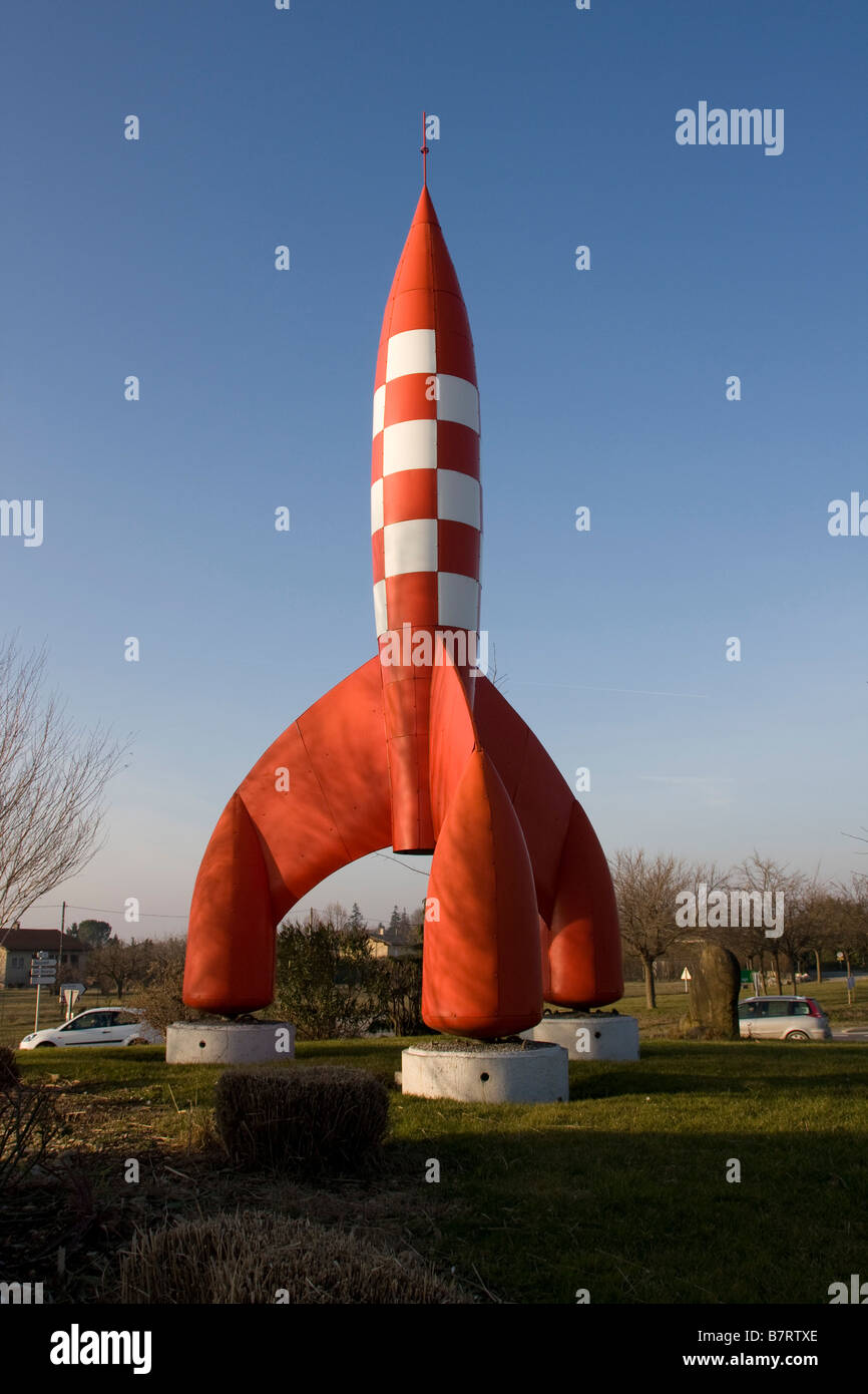 Red and white rocket model. blue sky. Hergé Tintin story. moon landing ...