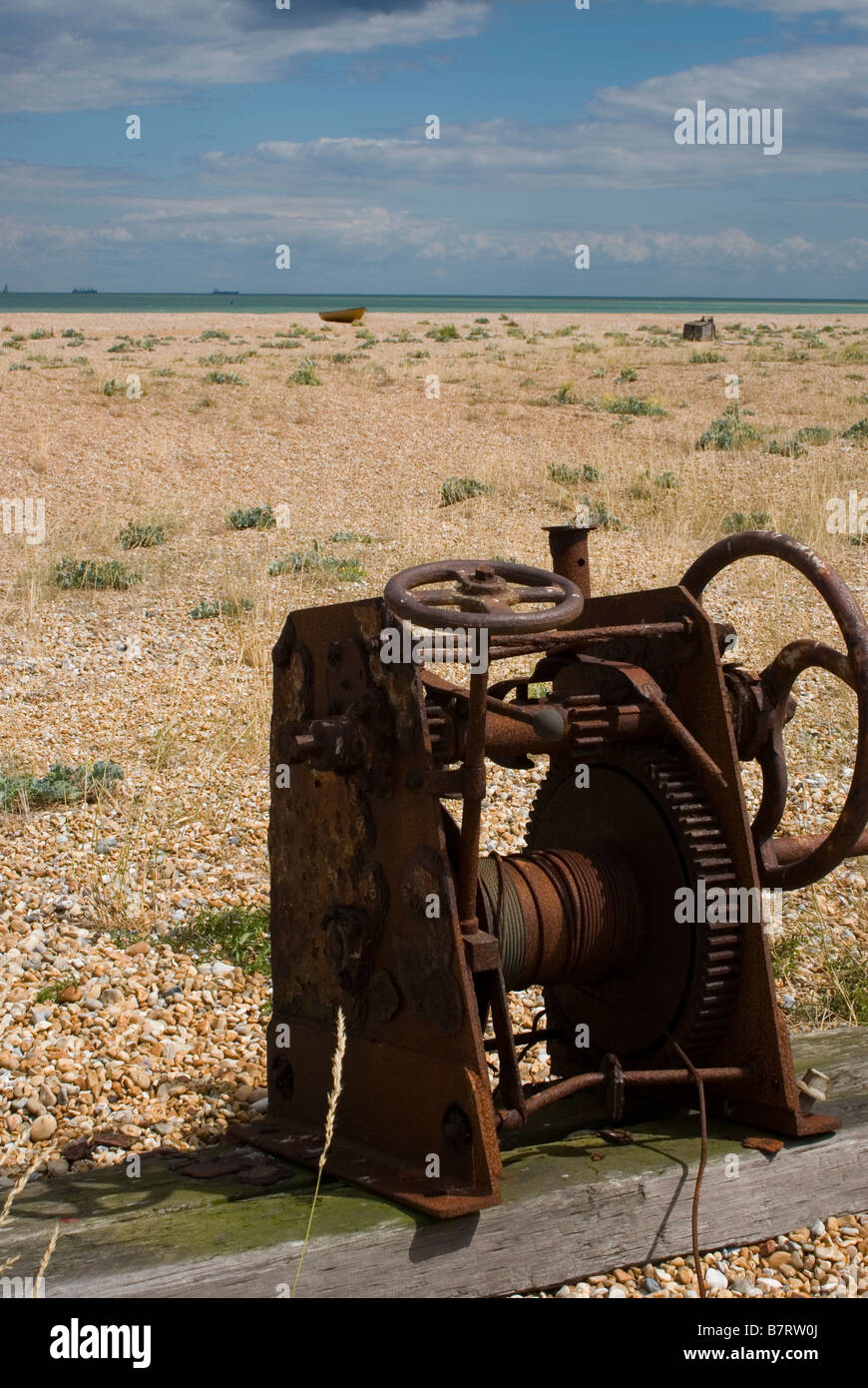 Rusty winch on shingle beach Stock Photo - Alamy