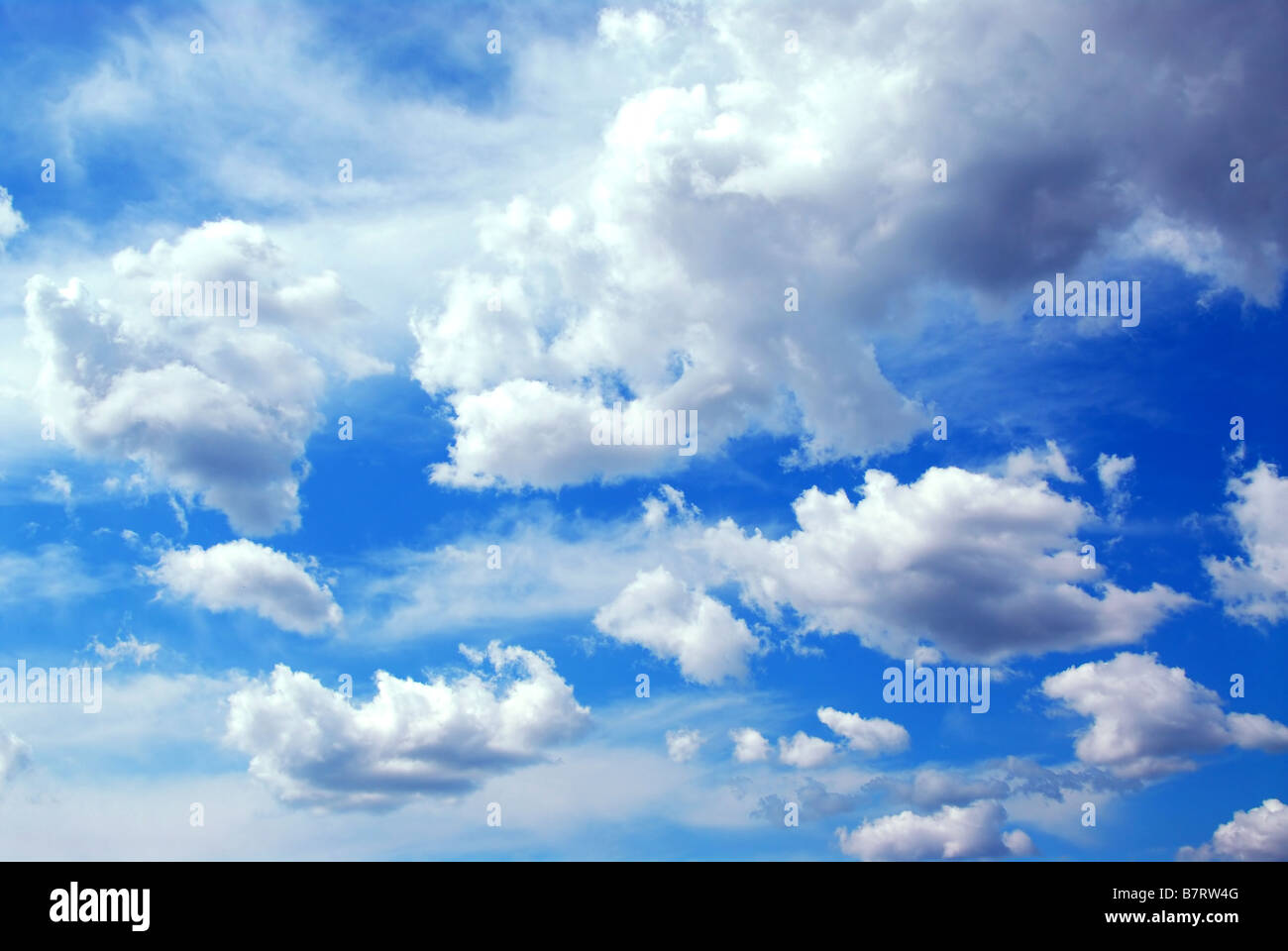 Deep blue cloudy sky background Stock Photo - Alamy