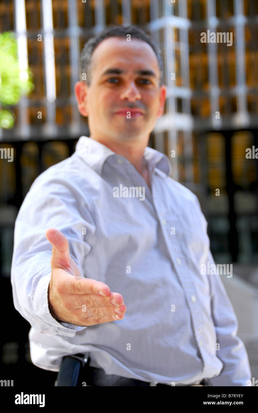 Businessman offering his hand Stock Photo - Alamy Businessman offering his hand Stock Photo - Alamy