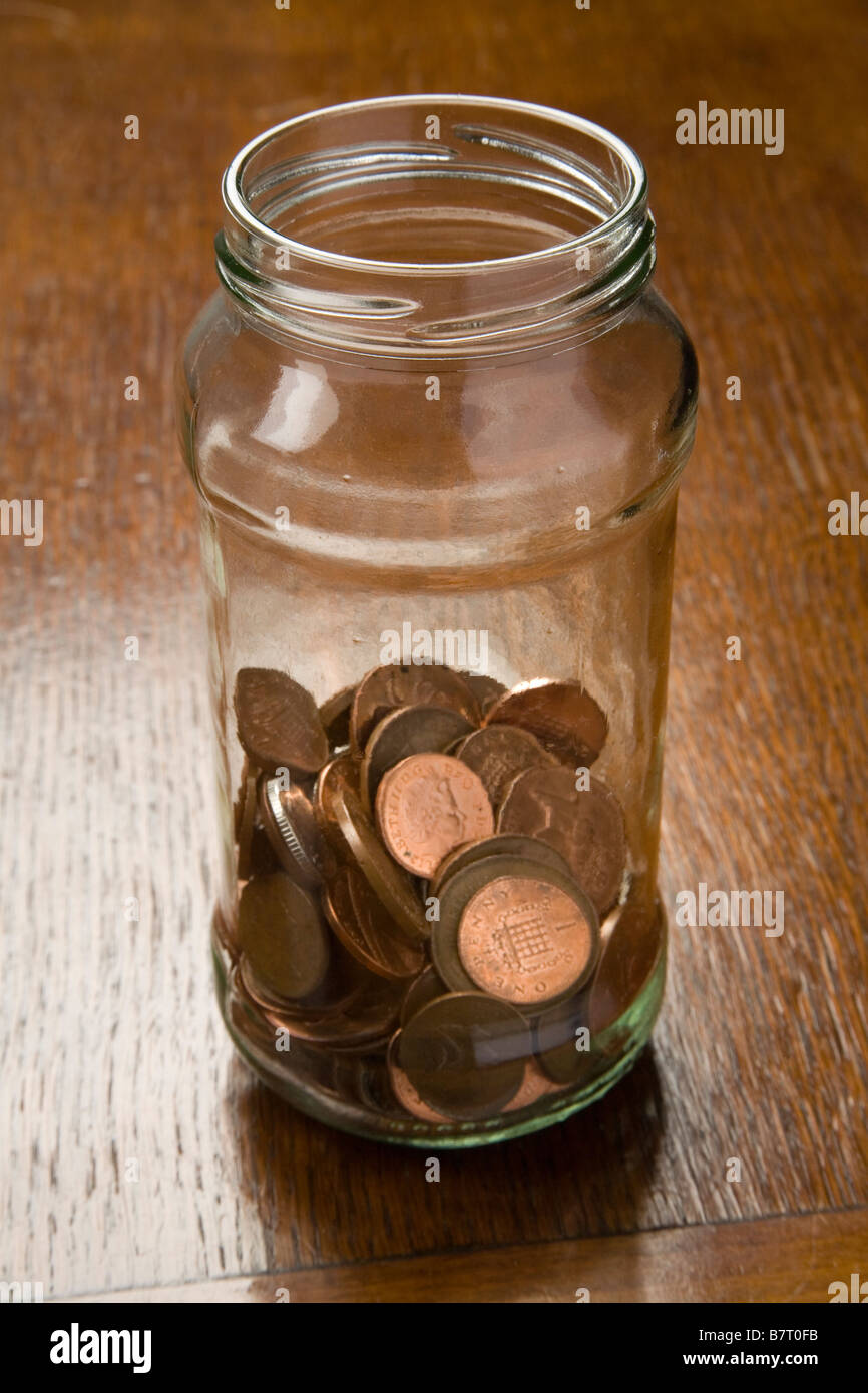 Change saved in a Jar Stock Photo - Alamy