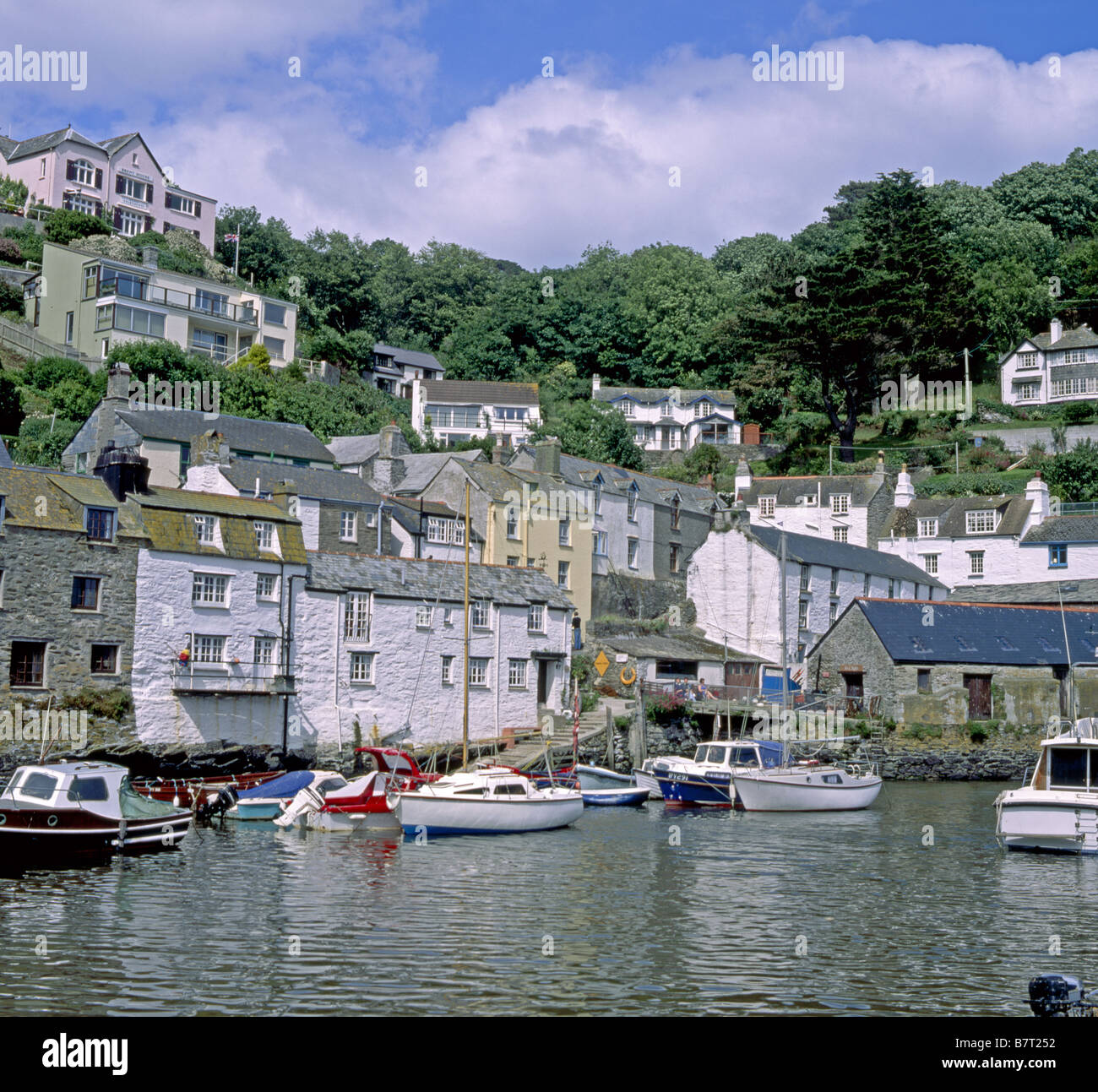 Fishing boats & boats Polperro Harbour Cornwall England Stock Photo - Alamy