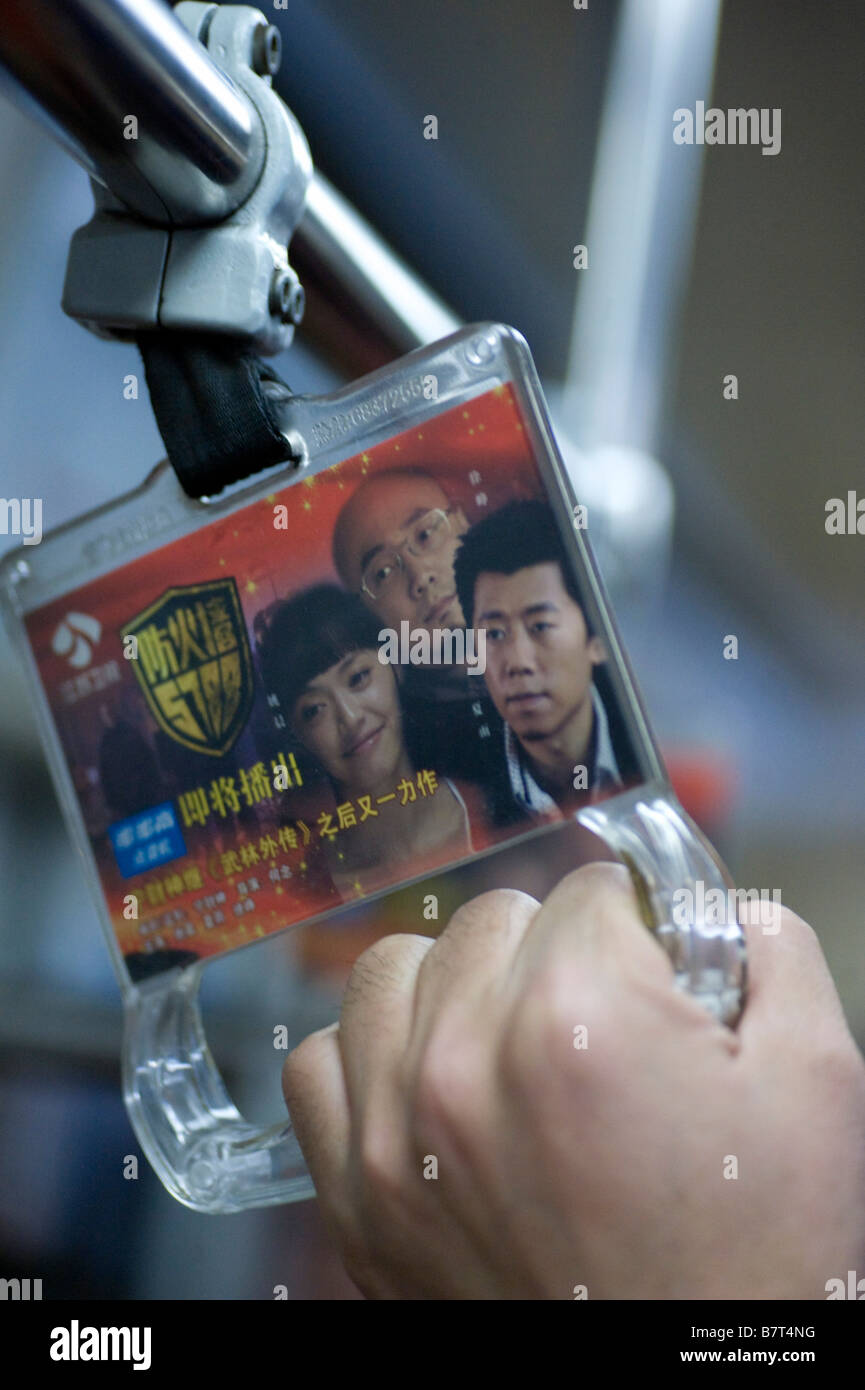 Hand holding strap on train hi-res stock photography and images - Alamy