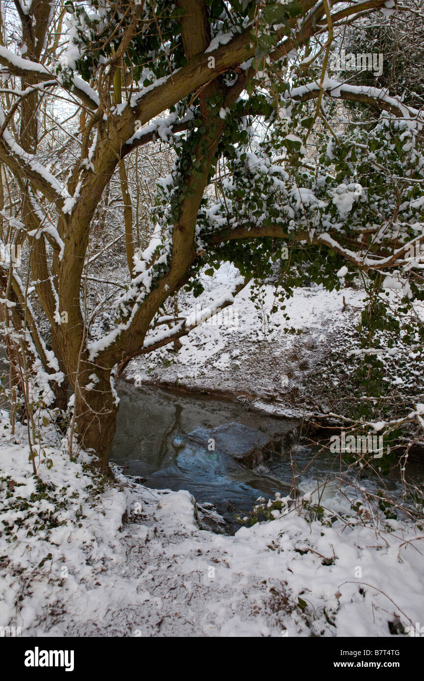 Stream and waterfall in the snow Redhill Surrey Stock Photo - Alamy