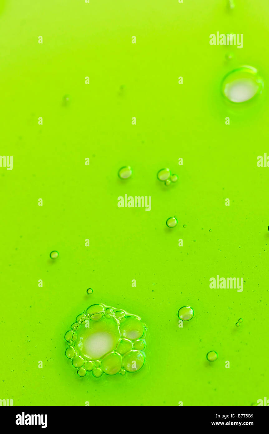 Abstract green gel liquid background with bubbles Stock Photo - Alamy