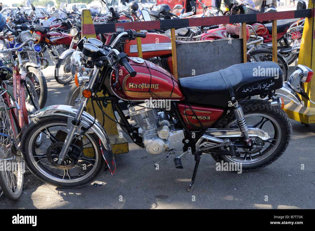 Chinese motorcycle in Luxor Street in Egypt Stock Photo - Alamy