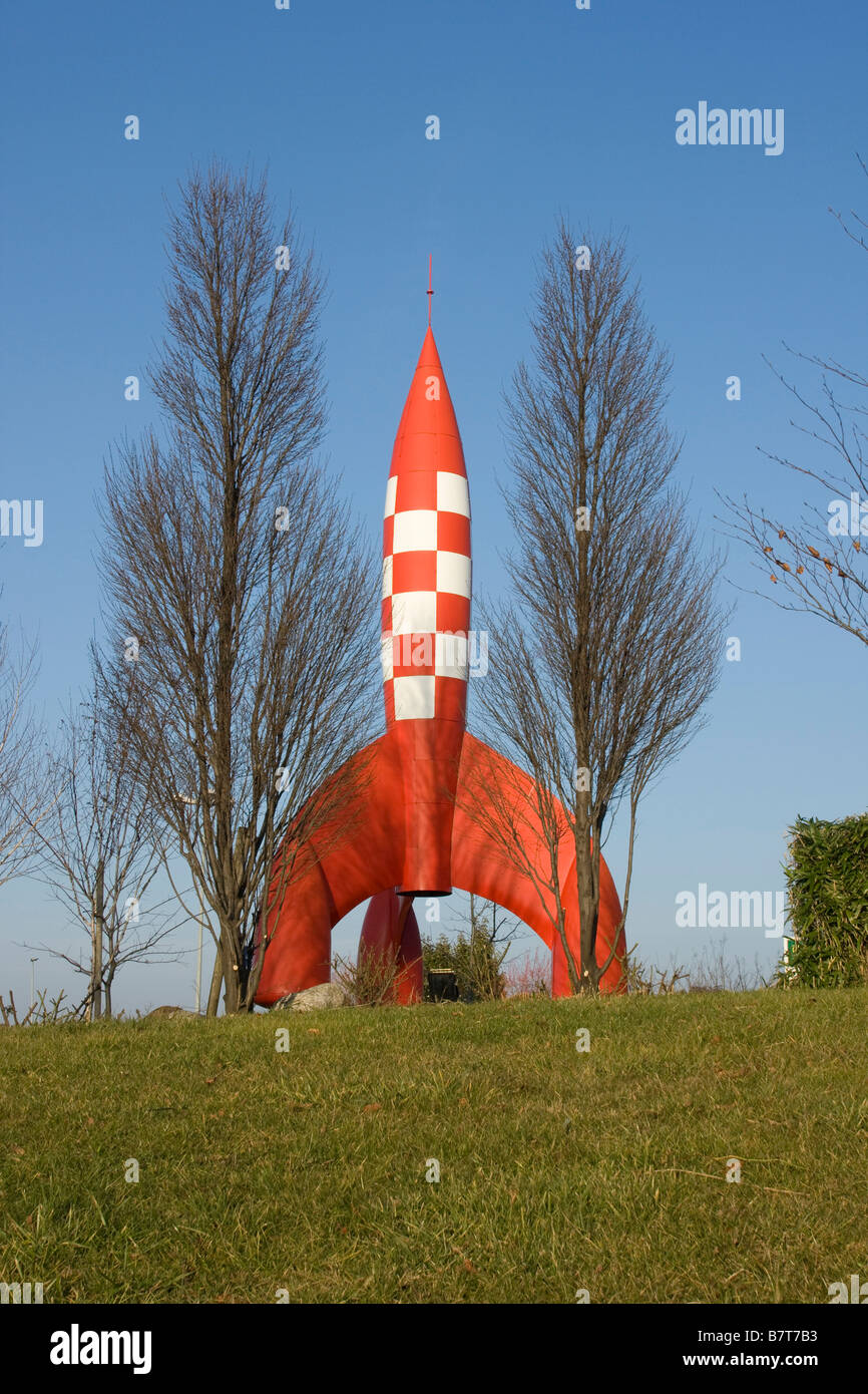 Red and white rocket model. blue sky. Hergé Tintin story. moon landing ...