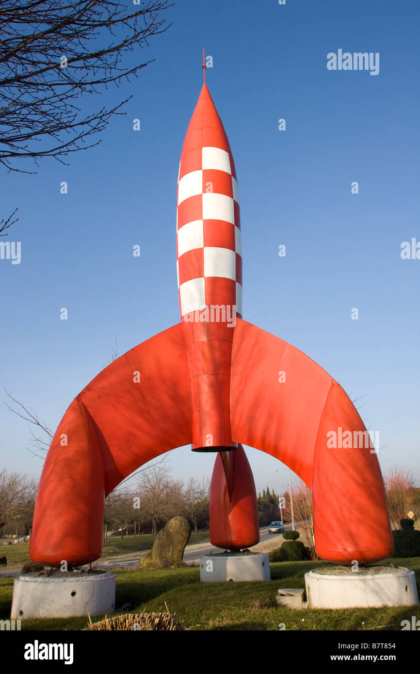 Red and white rocket model. blue sky. Hergé Tintin story. moon landing ...
