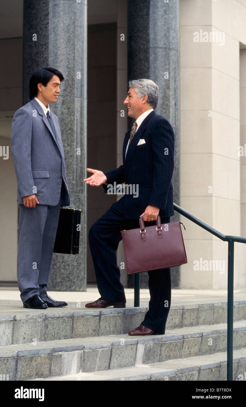 Attorneys at work on courthouse steps in a Business Meeting Stock Photo ...