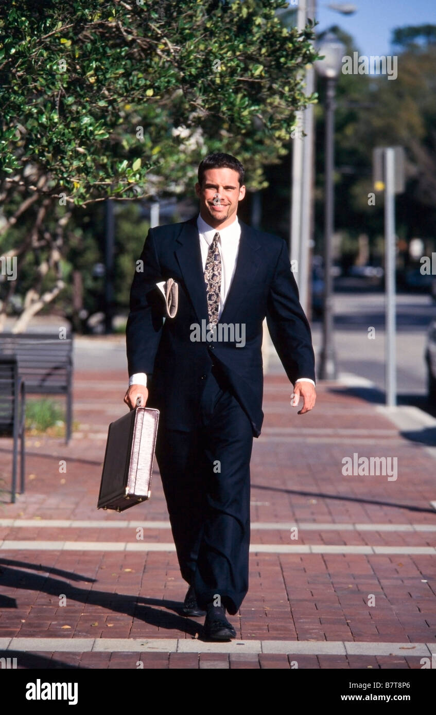 Executives at work on street, direct portrait Stock Photo - Alamy