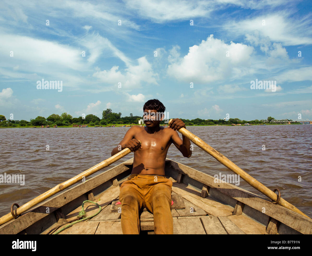 Man with rowing boat hi-res stock photography and images - Alamy