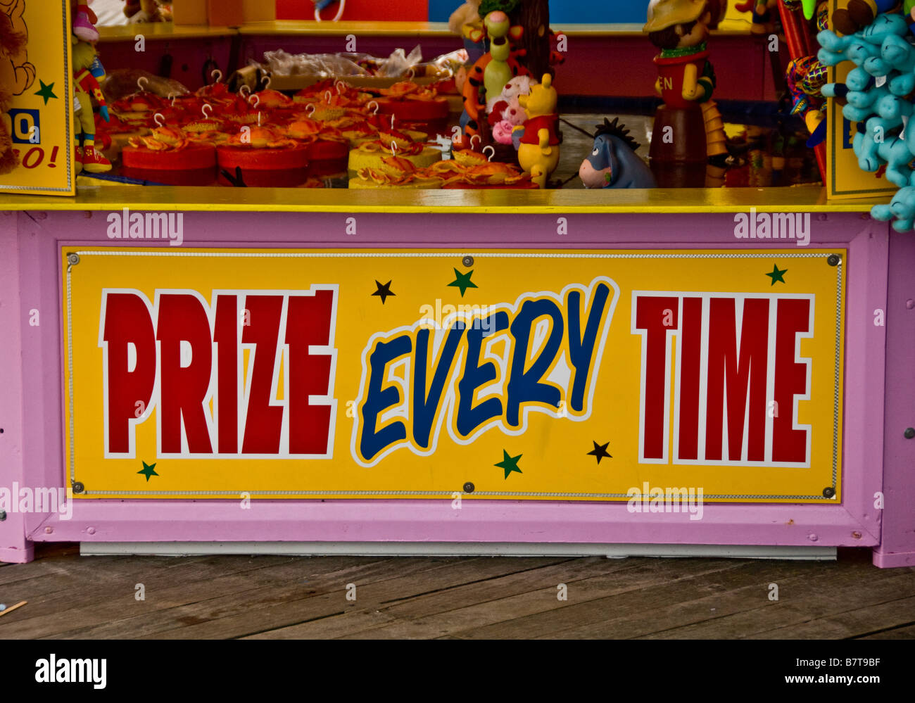 Prize every time sign at seaside amusements. UK Stock Photo - Alamy