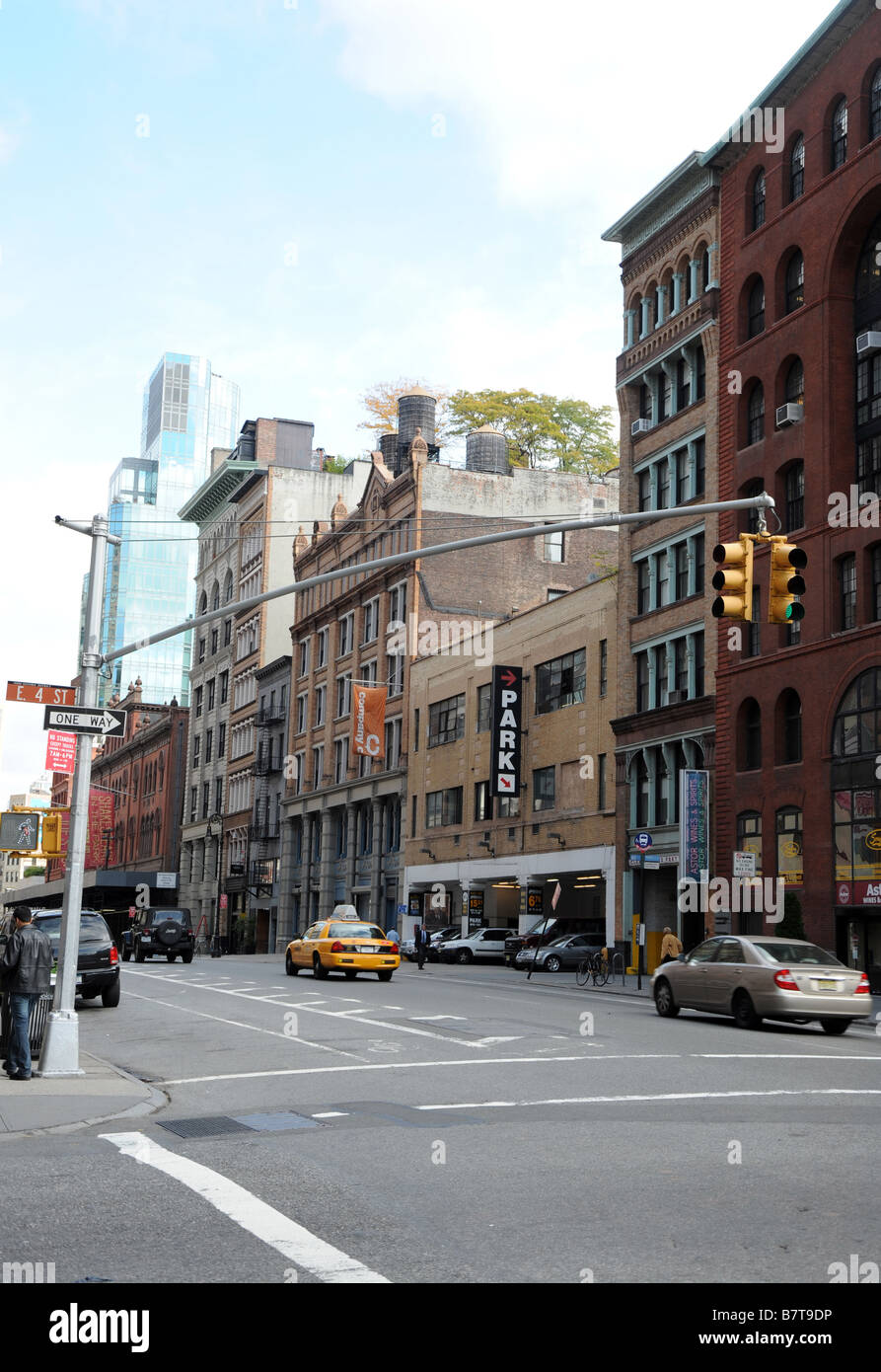 East 4th Street and and 4th Avenue, Brownstones and traffic Stock Photo ...