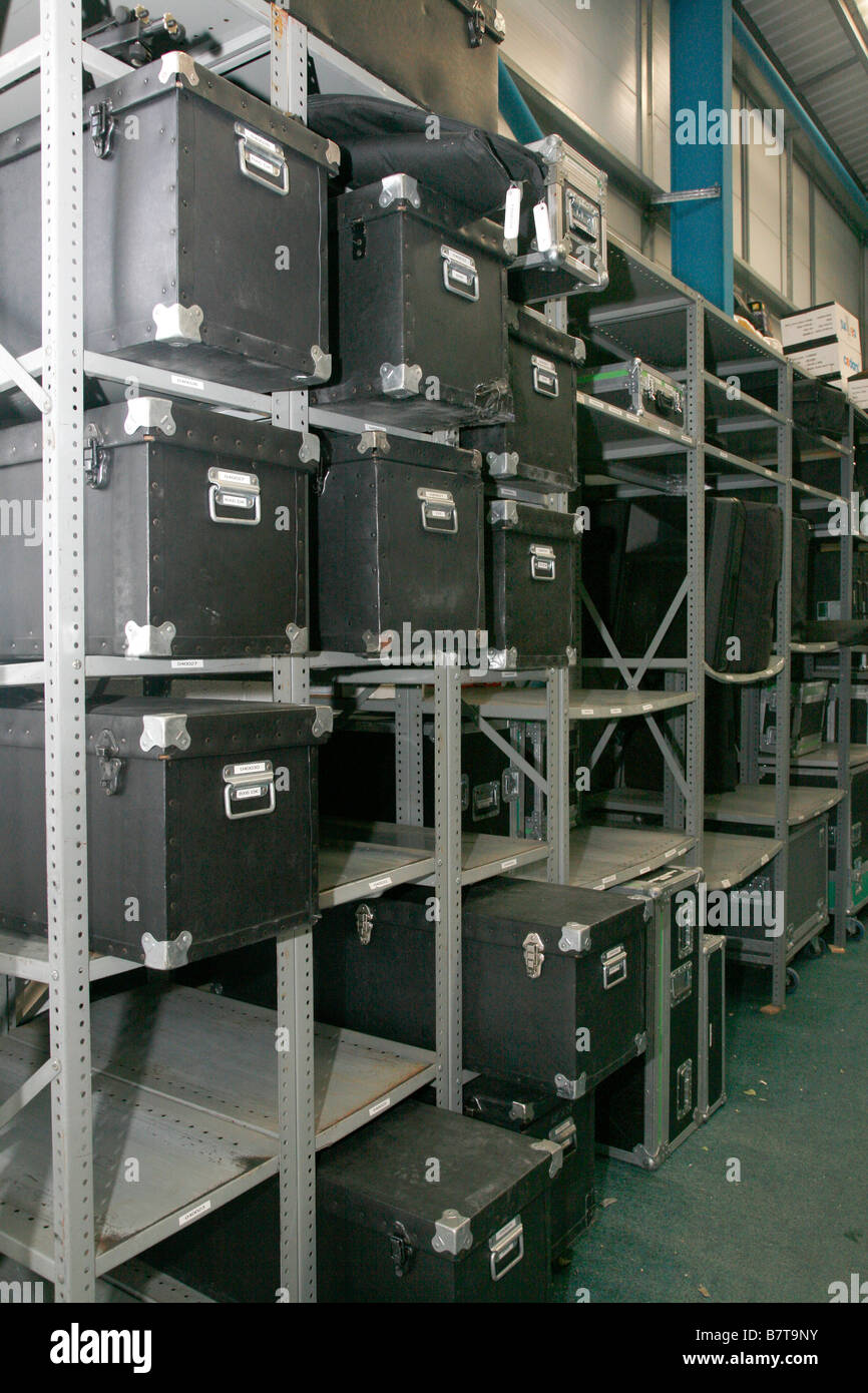 A metal rack of boxes in a warehouse Stock Photo - Alamy