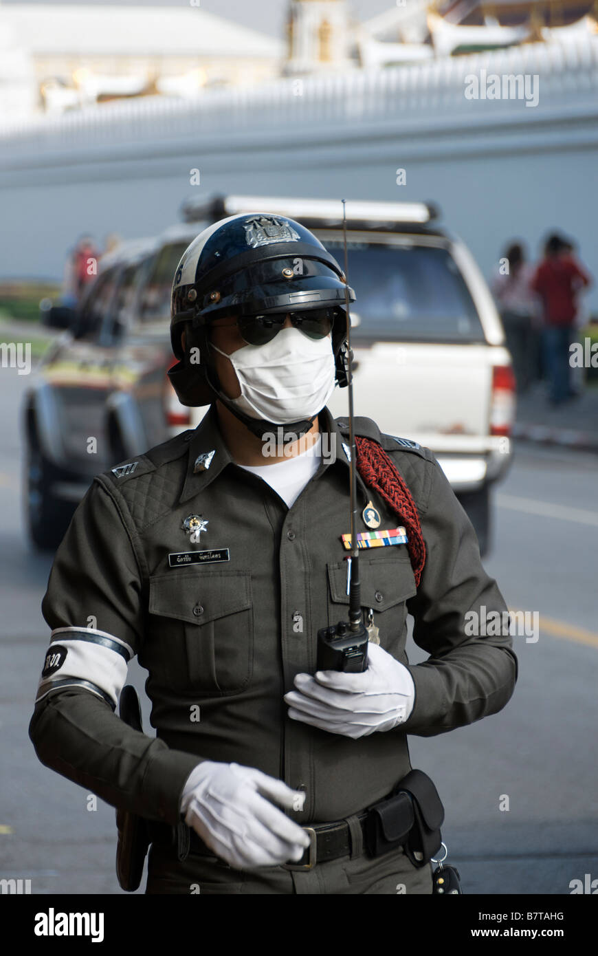 Police traffic control officer wearing mask against pollution Pathumwan ...