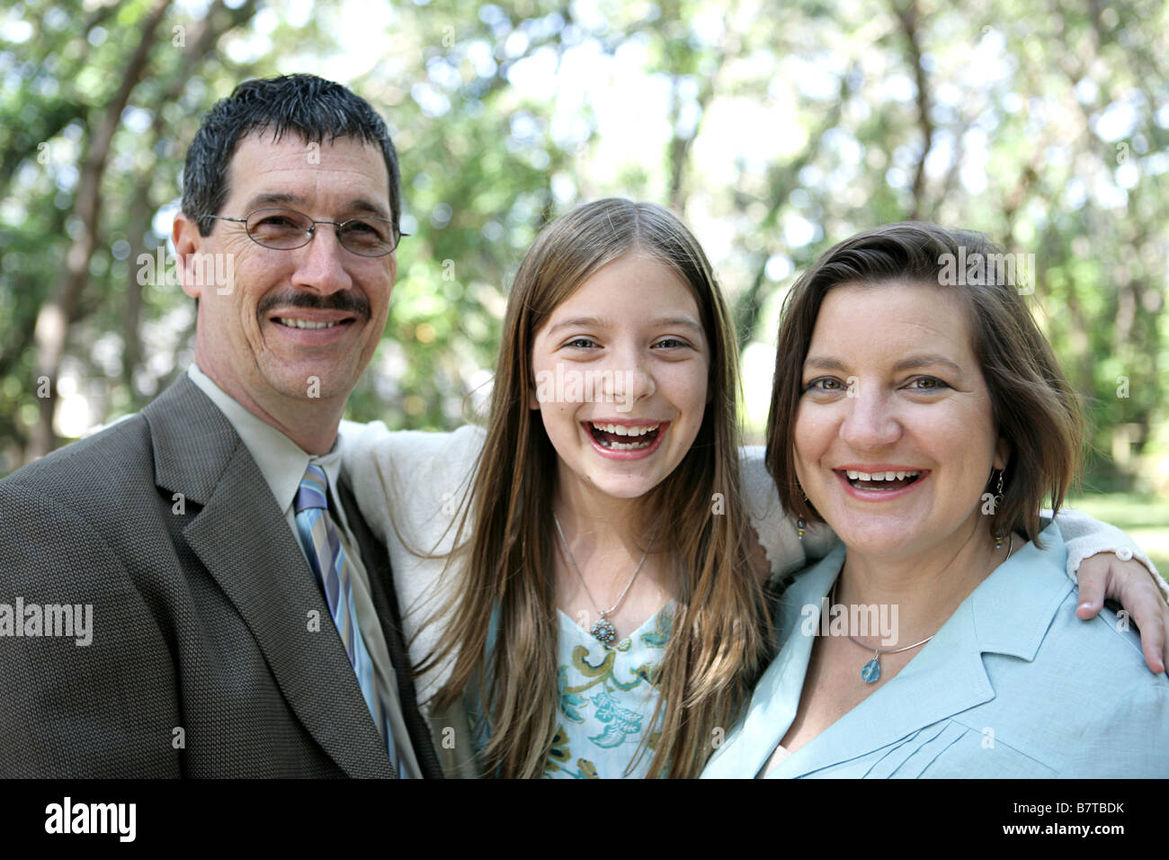 A happy family laughing together Focus on mom daughter Stock Photo - Alamy