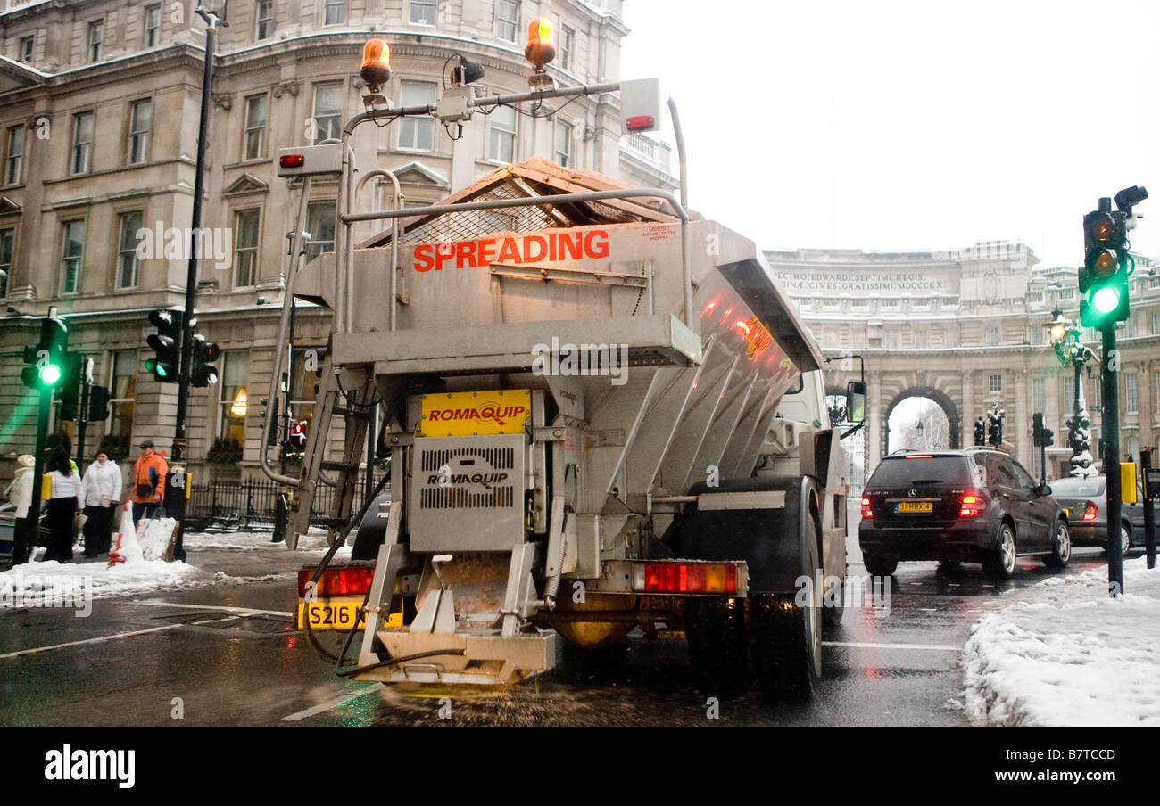 Spreading Grit At Trafalgar Square London UK Europe Stock Photo - Alamy