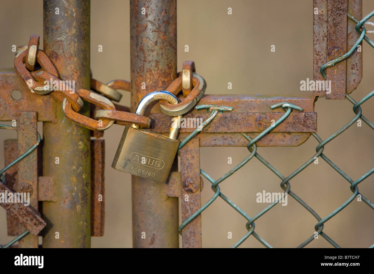 Locked gates baring entry to an old coal mining site Stock Photo - Alamy