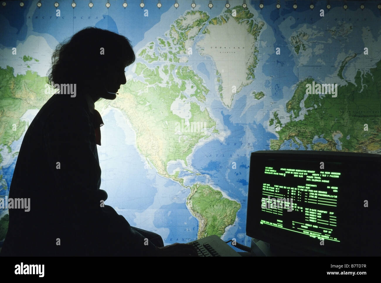 Executives at work in office setting with computer Stock Photo - Alamy