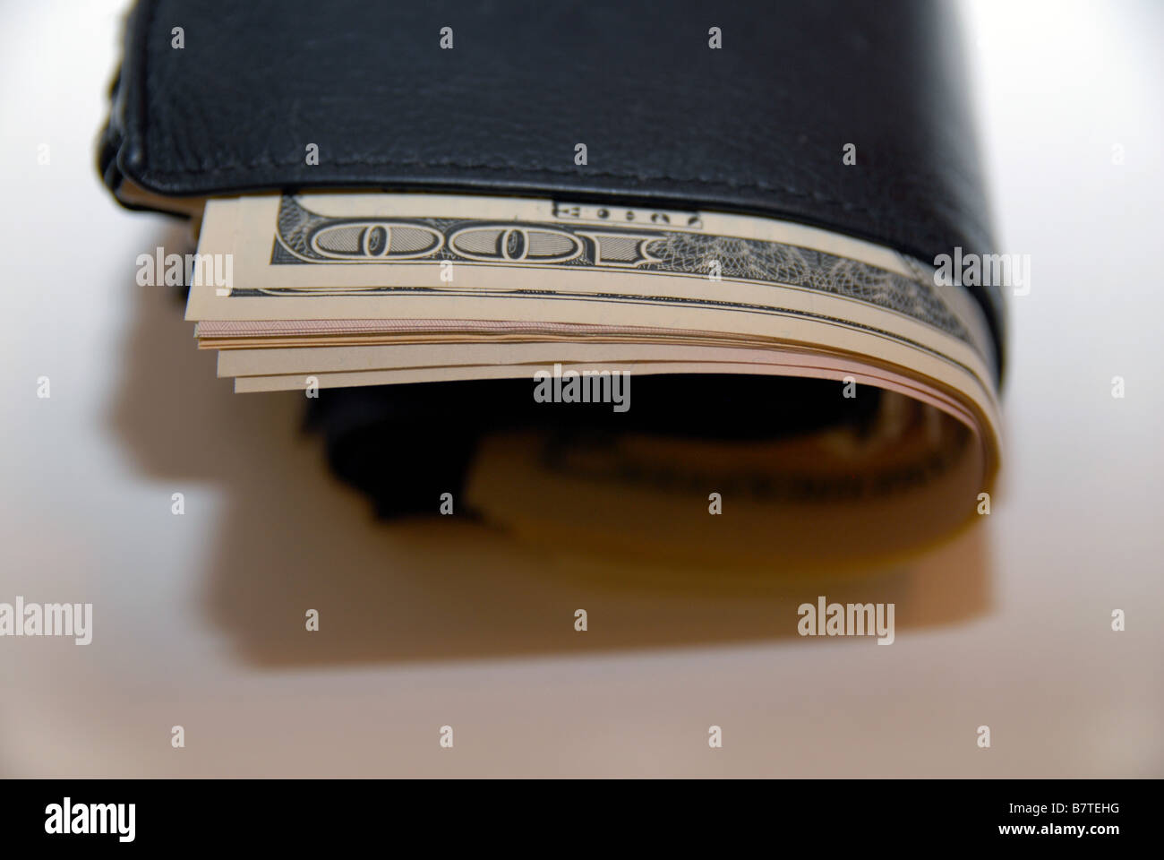 Bank notes currency money in a full wallet Stock Photo - Alamy
