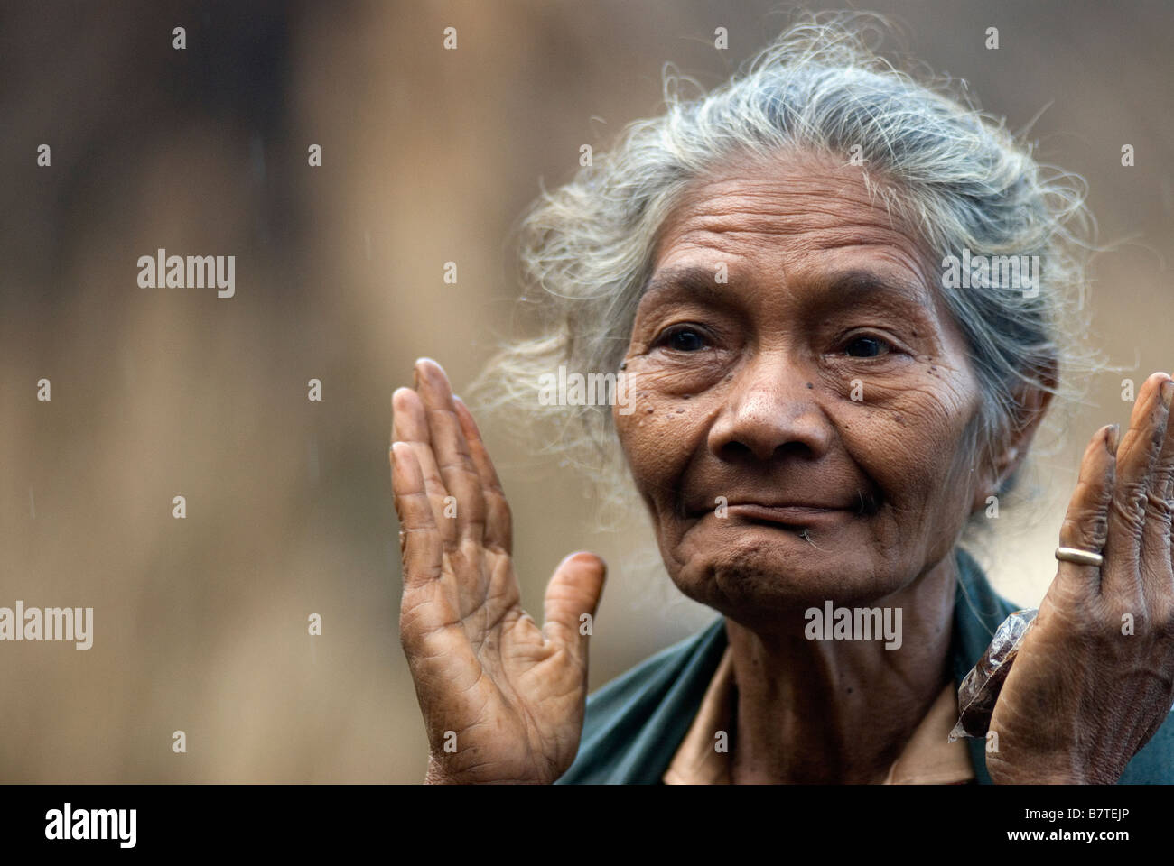 Portrait taken in the traditional village of Kampong Luba near Bajawa ...