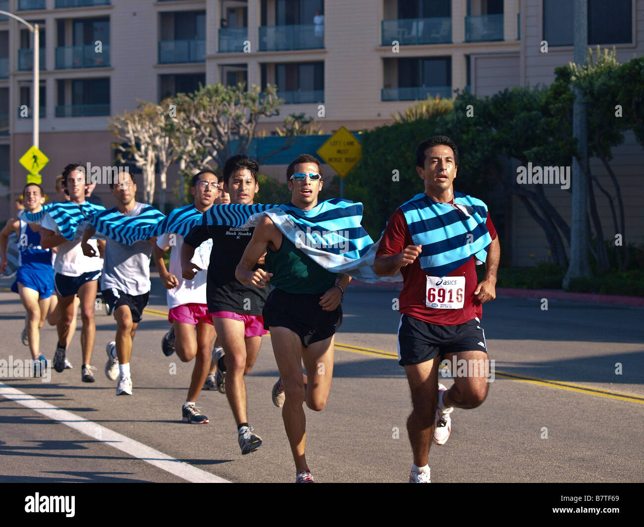 Multicultural group of runners lead the Centipede catagory in the ...