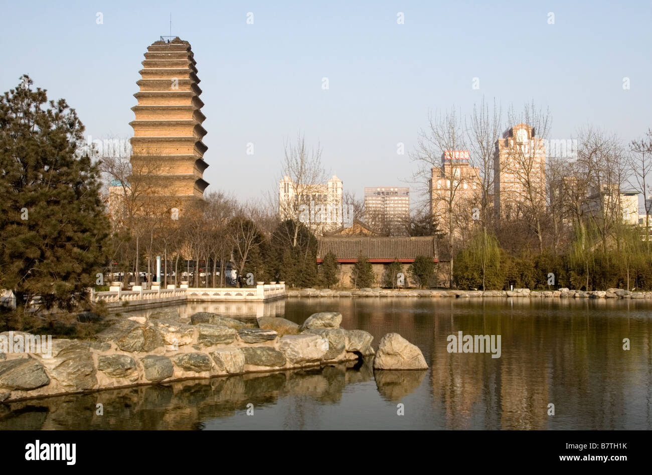 The Small Goose Pagoda set in park with water features in Xian in China ...