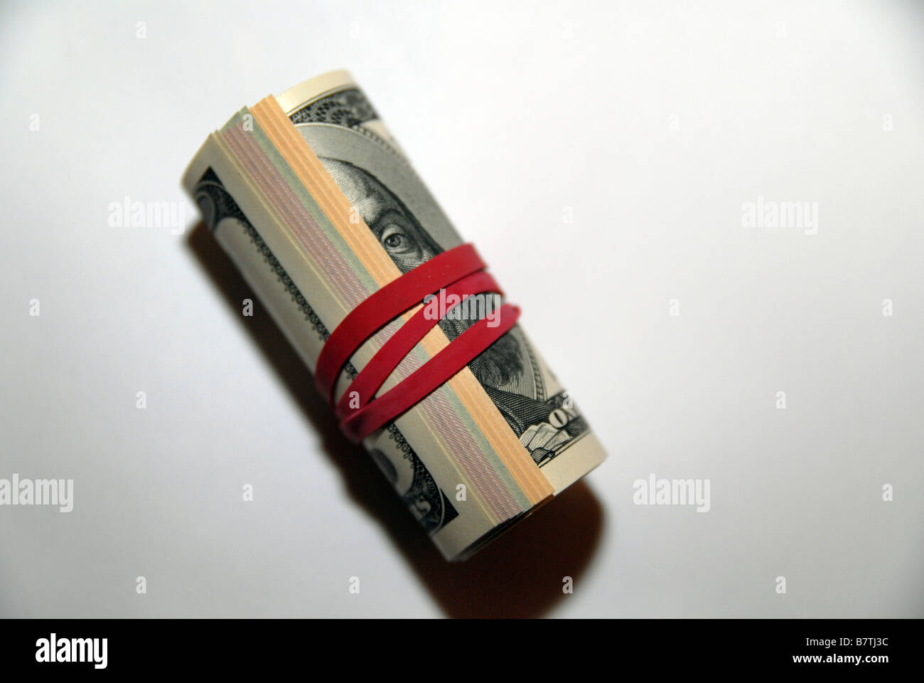 Rolled up dollar bill hi-res stock photography and images - Alamy