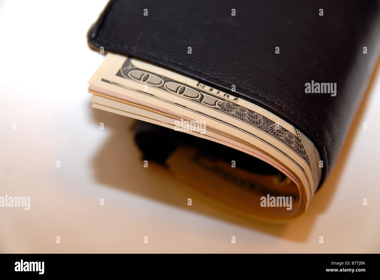Bank notes currency money in a full wallet Stock Photo - Alamy