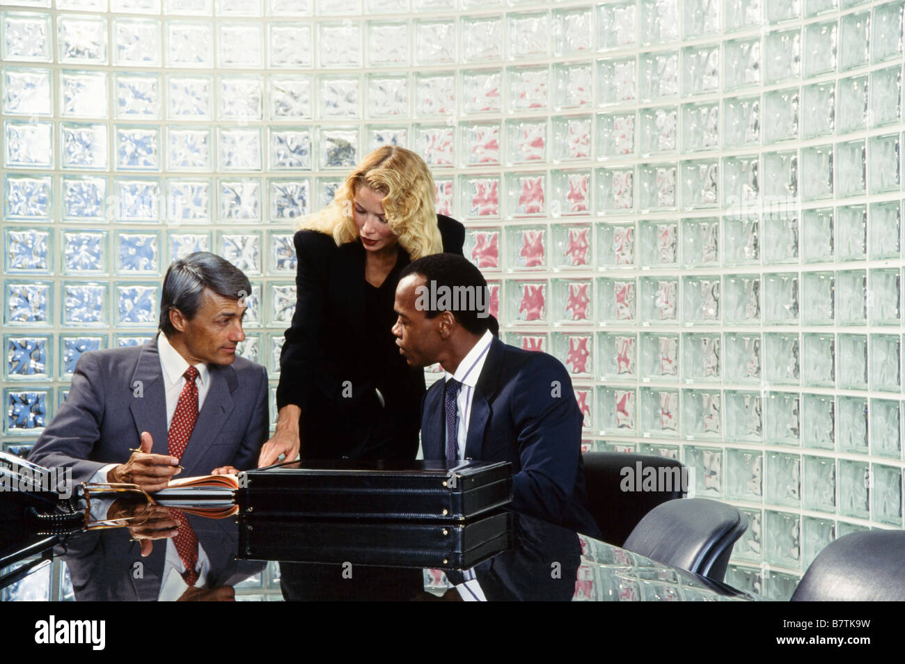 Executives at work in conference room, in a Business Meeting Stock ...