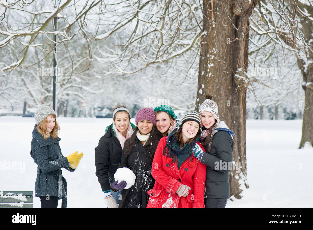 Students play snowballs on The Common covered in snow Ealing W5 London ...