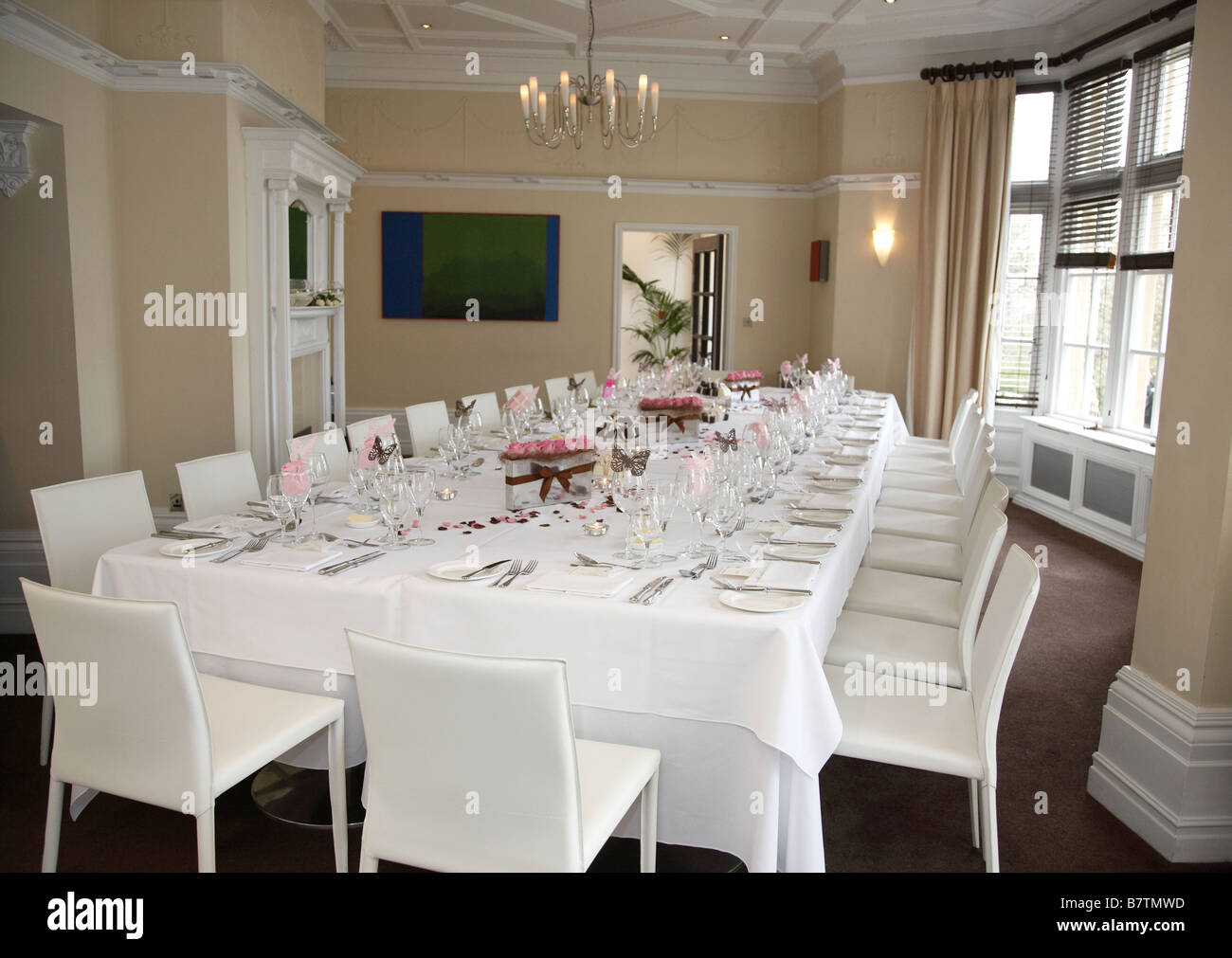 Wedding banquet table waiting for the guests to arrive Stock Photo - Alamy