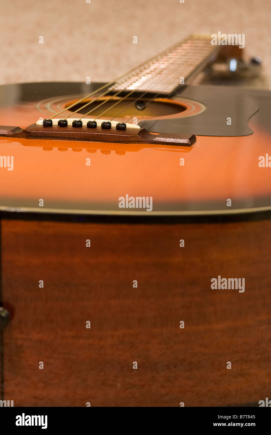 An acoustic guitar profile shot Stock Photo - Alamy