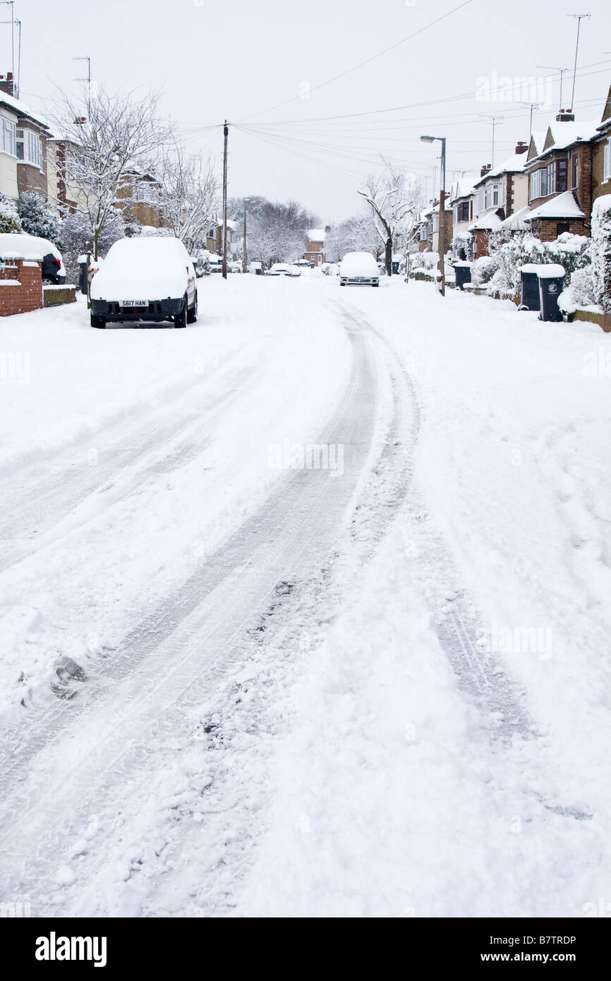 Snow on a suburban road Stock Photo - Alamy