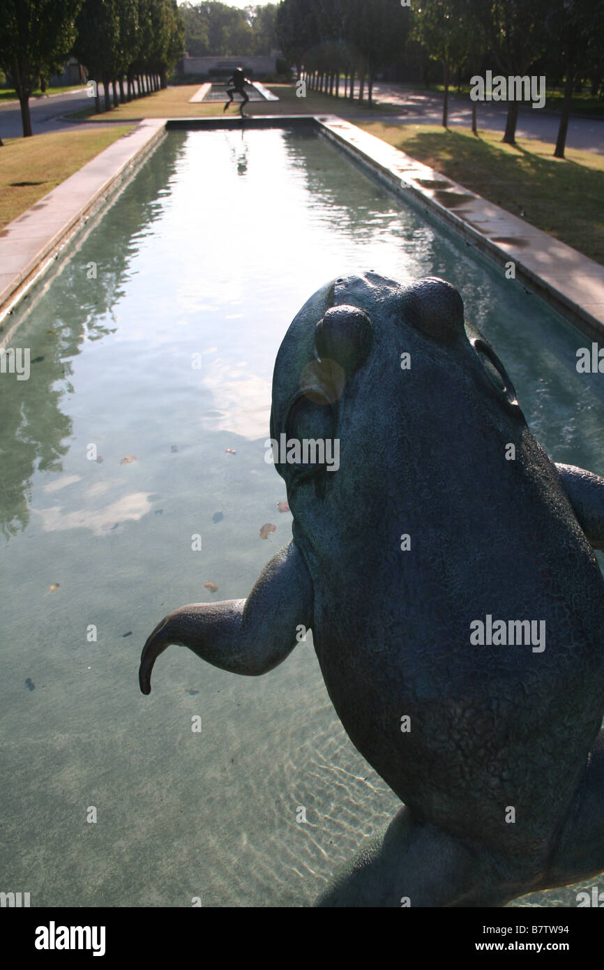 frog sculpture in reflecting pool at botanical garden in fort worth ...