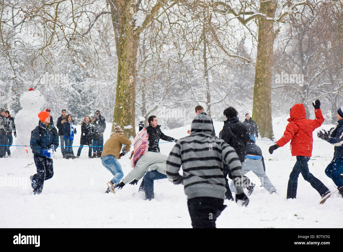 School children are having snowball fight in Kensington Gardens Stock ...