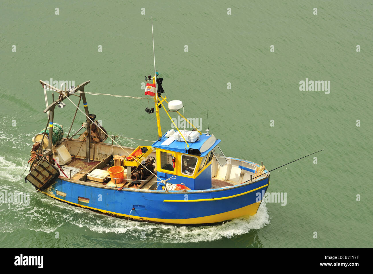 A small fishing boat returning to harbour Stock Photo - Alamy A small fishing boat returning to harbour Stock Photo - Alamy
