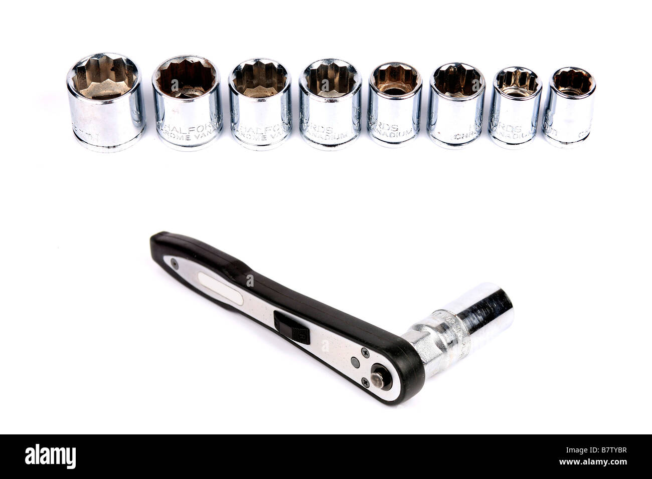 A socket wrench mechanics tool against a white background Stock Photo ...