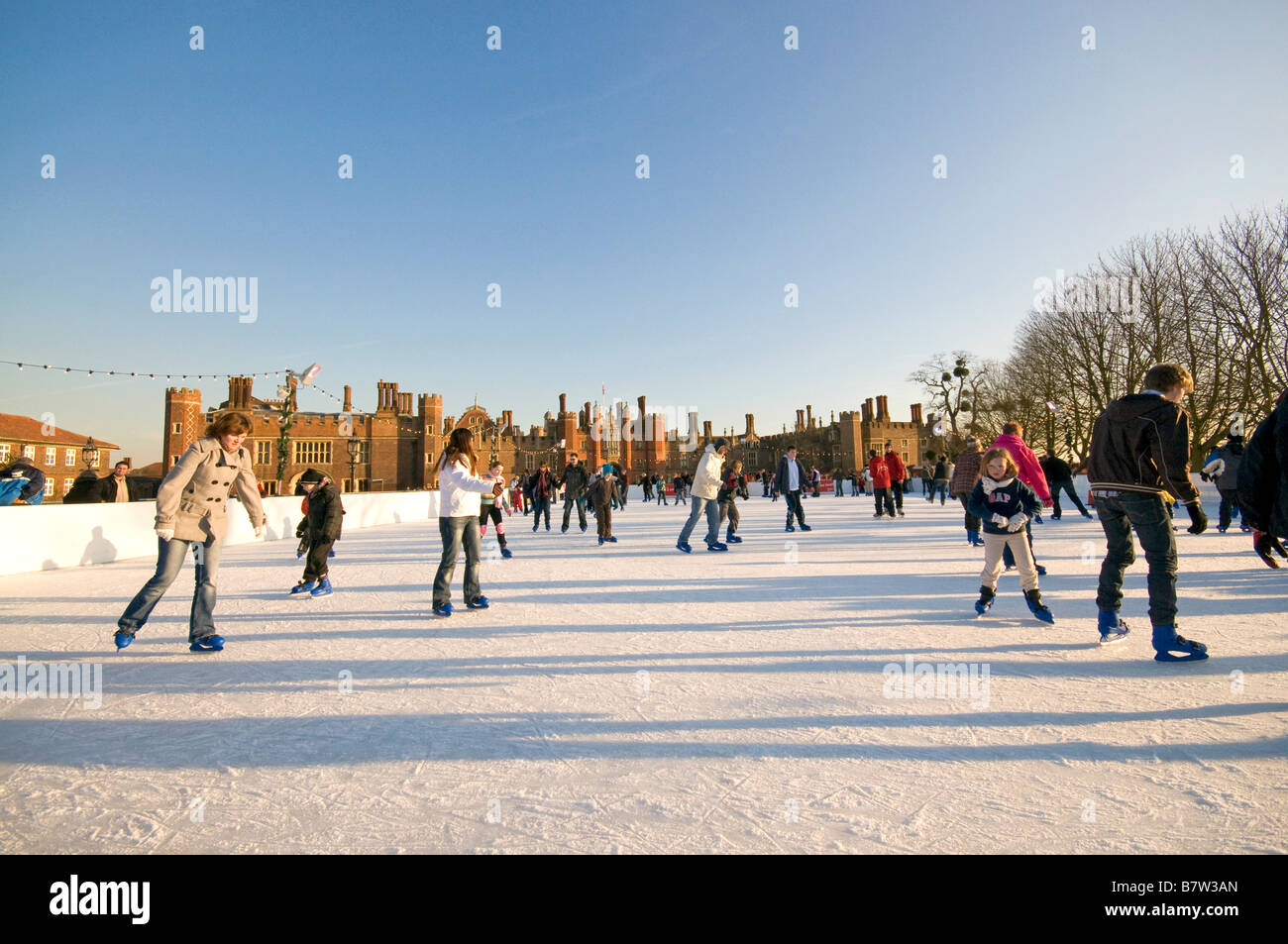 People skating on ice-rink at Hampton Court Palace Stock Photo - Alamy