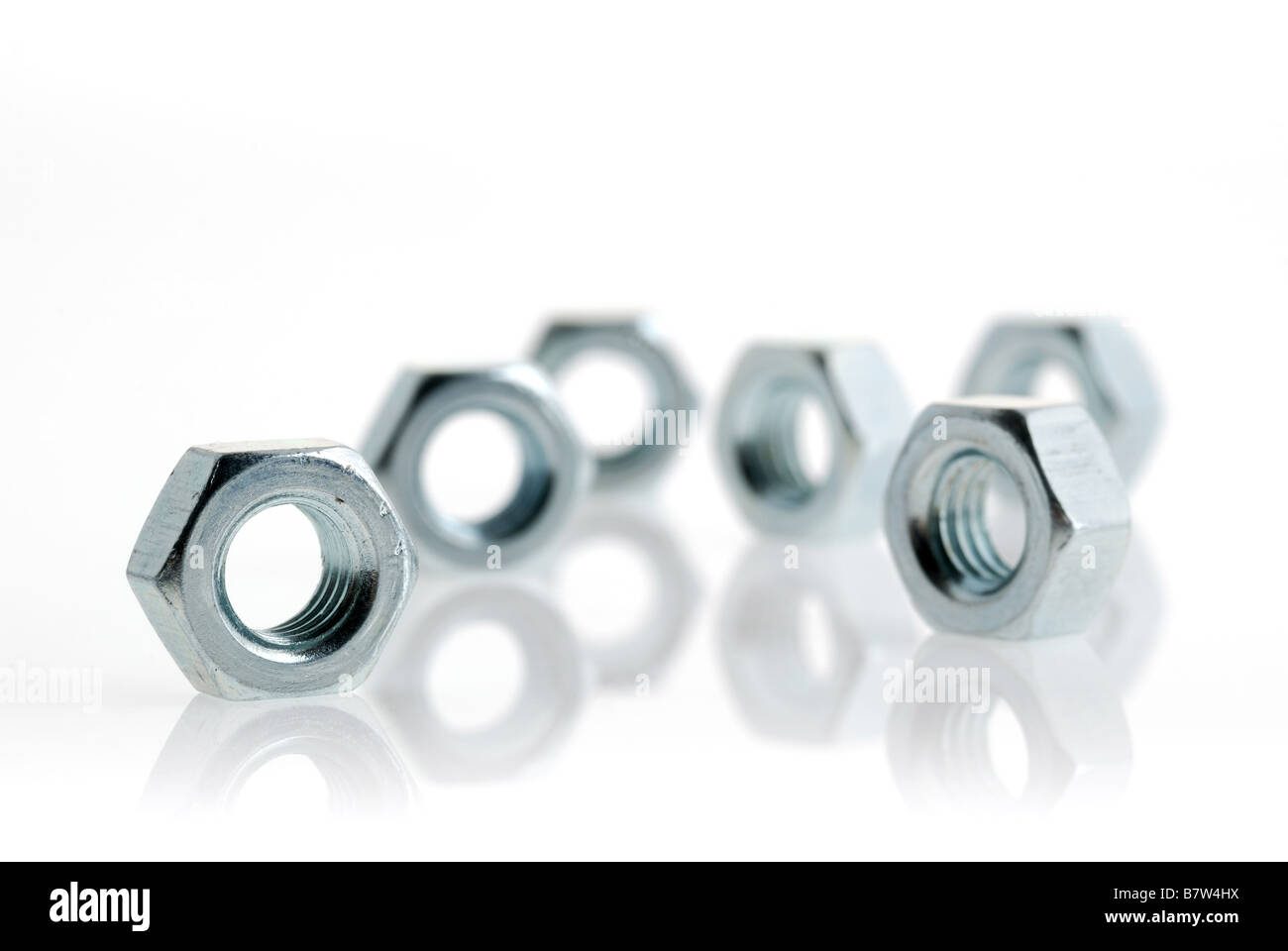 nuts Fixing details for a fastening of details Stock Photo - Alamy