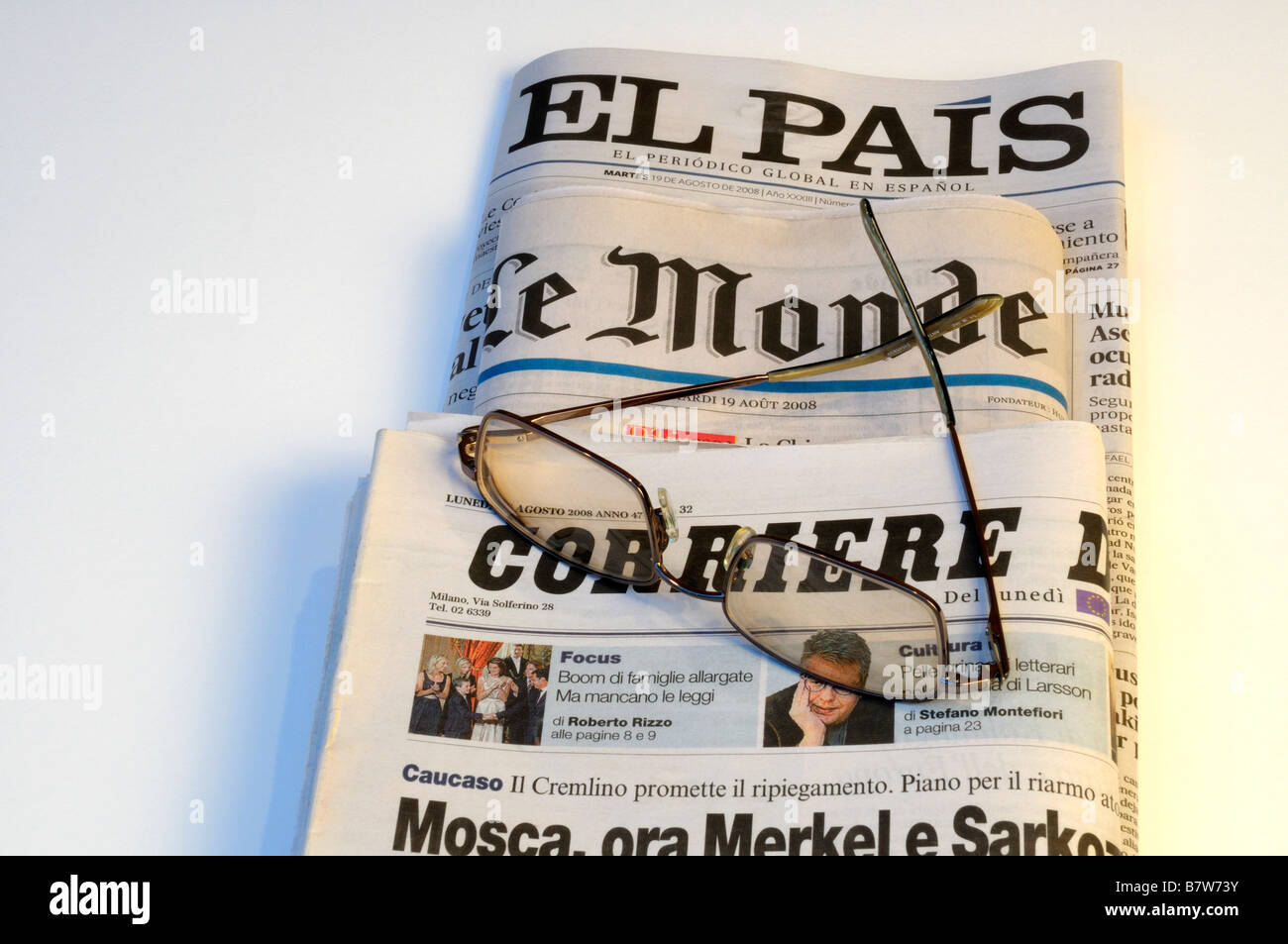 European Newspapers with Glasses Stock Photo - Alamy