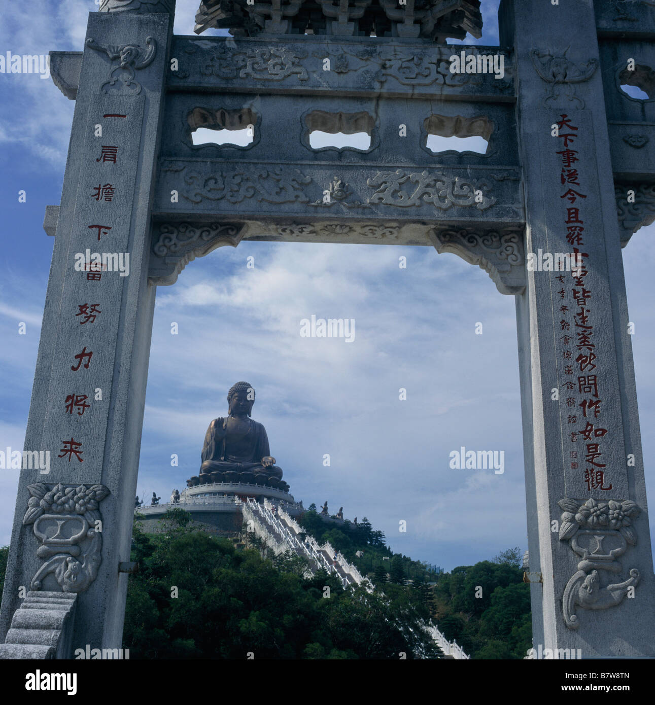 Big Buddha Seated statue on hill Hand raised Steep steps Framed by ...