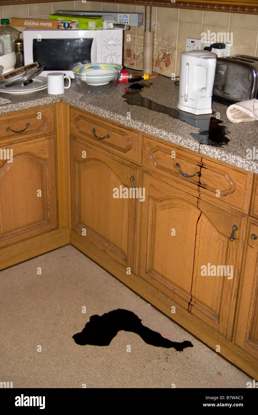 syrup spilled on a kitchen floor Stock Photo - Alamy