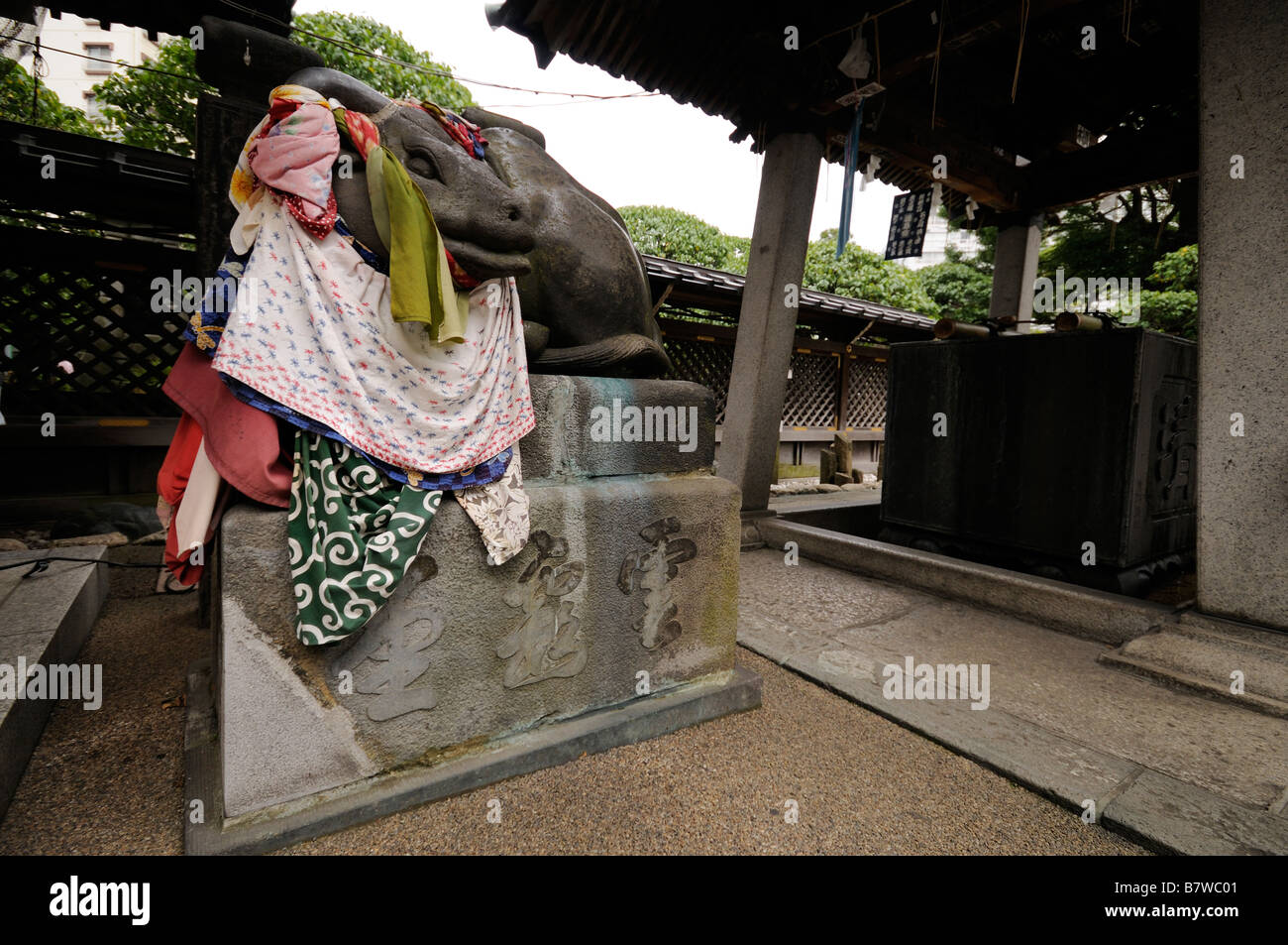 Deity with offerings. Yushima Tenjin Shrine. Founded in 1355 and ...