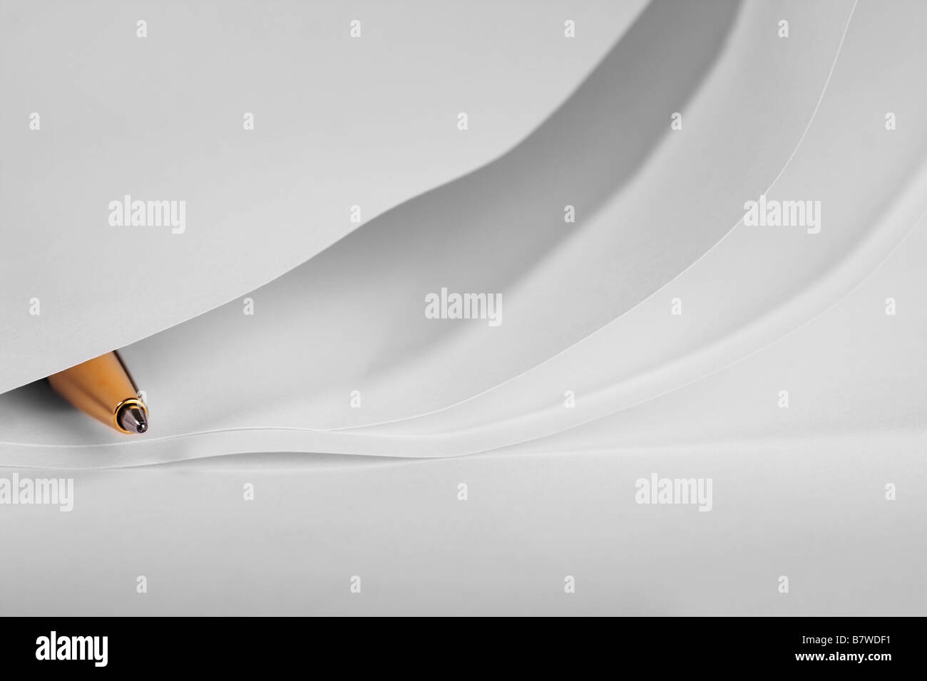 pen and paper with focus on the pen Stock Photo - Alamy