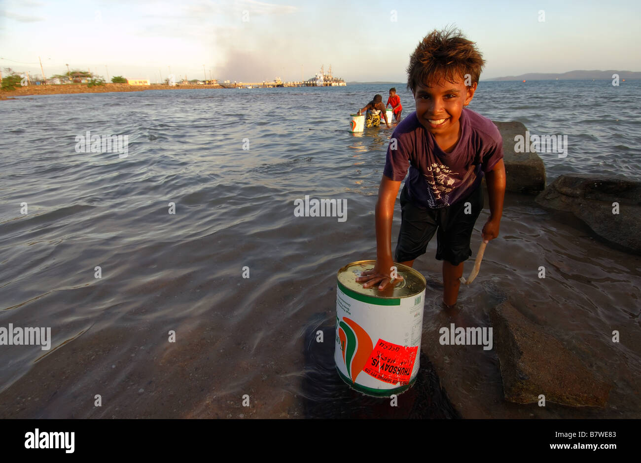 Aboriginal children playing in water hi-res stock photography and ...
