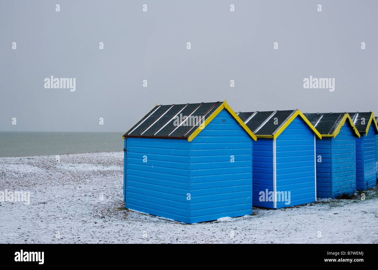 Beach Huts in Snow Stock Photo - Alamy