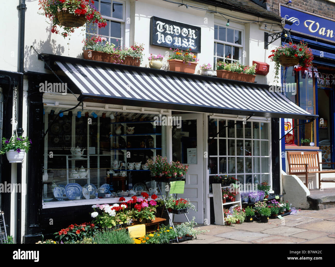 Tudor House shop Old building Flowers on display Tourist destination ...