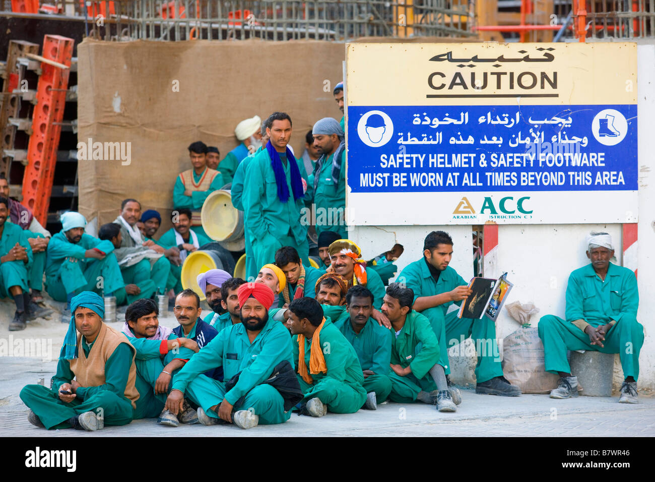 Construction workers waiting for their week s wages at Dubai Stock ...