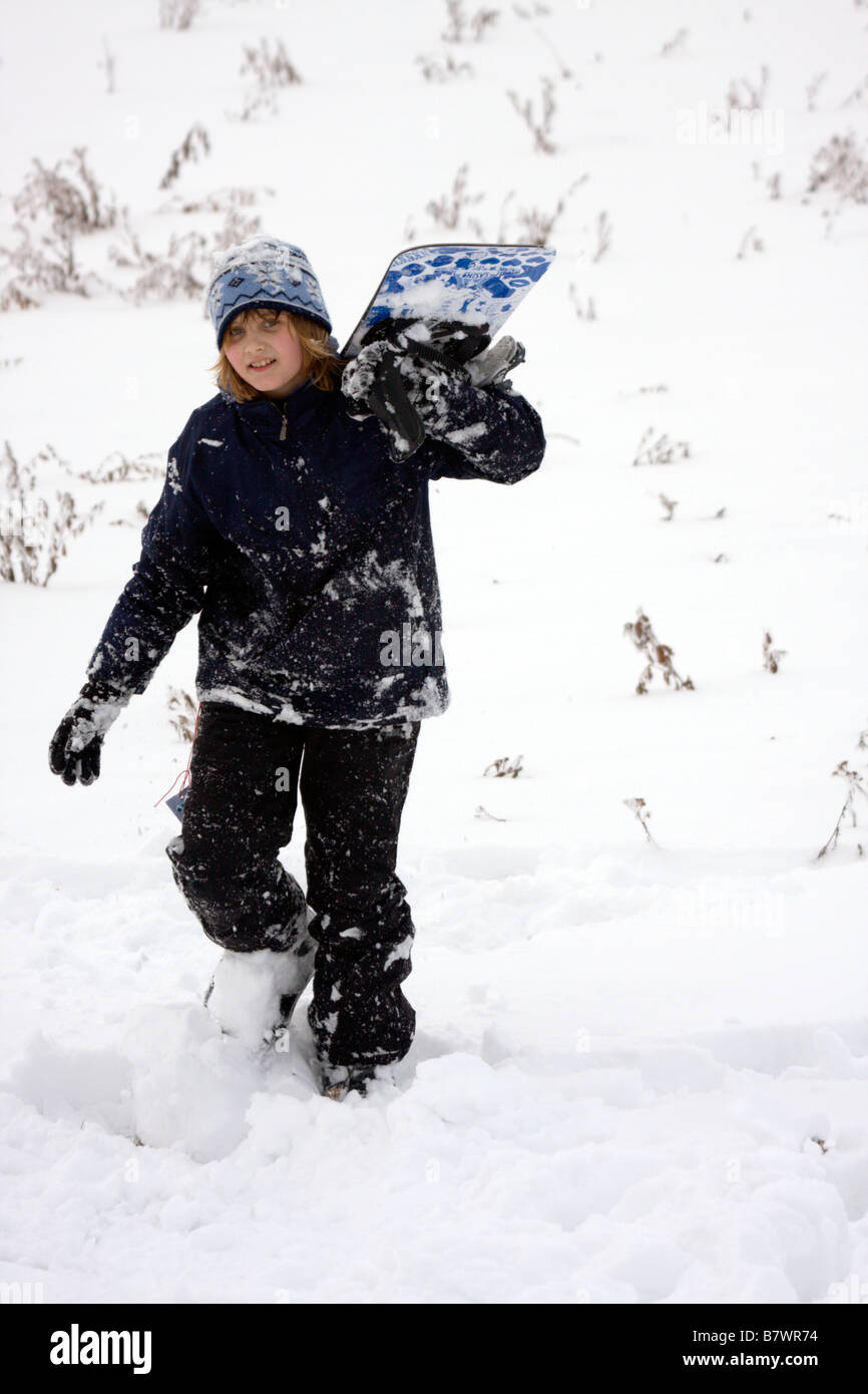 Teenage snowboarder having fun on the snow Stock Photo - Alamy